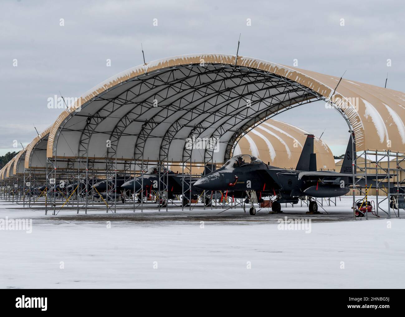 Canopies protect F-15E Strike Eagles from snow at Seymour Johnson Air ...
