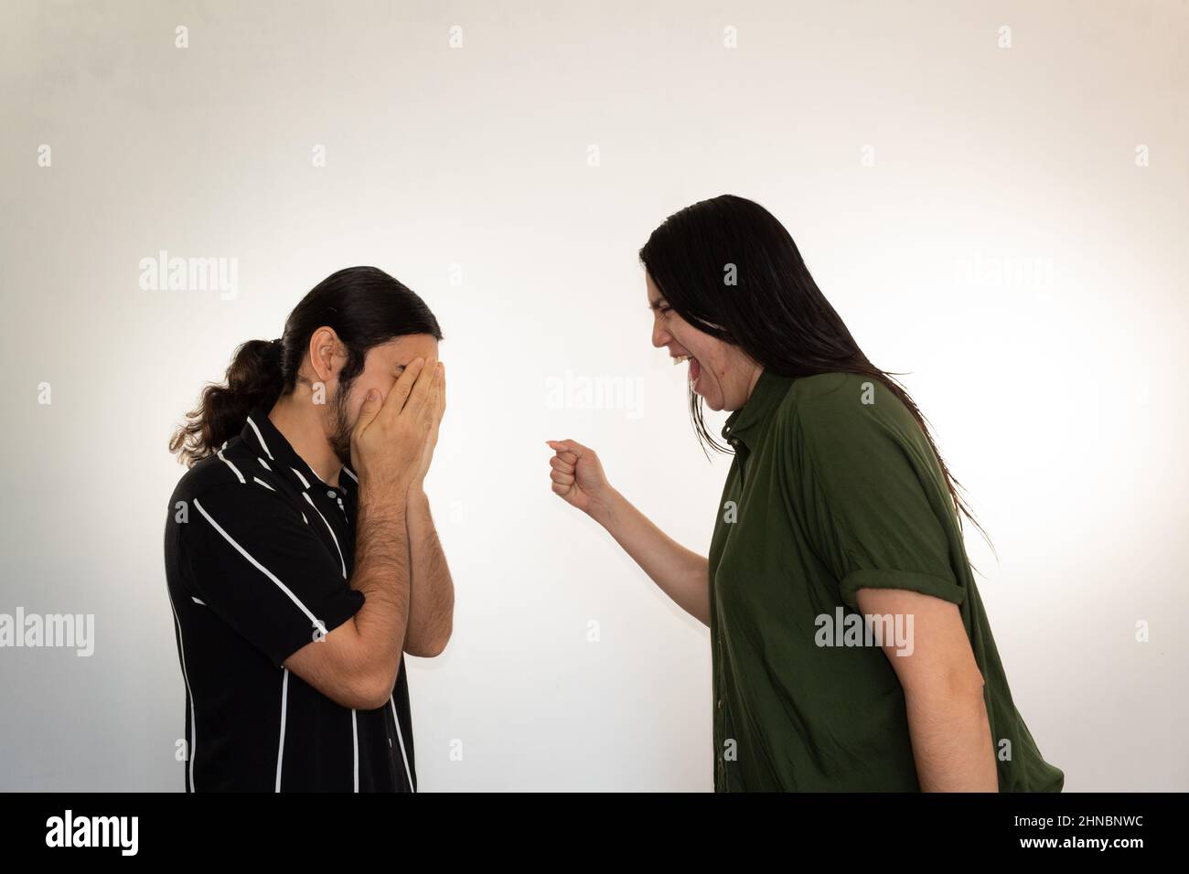 married couple fighting and screaming on a white background Stock Photo ...