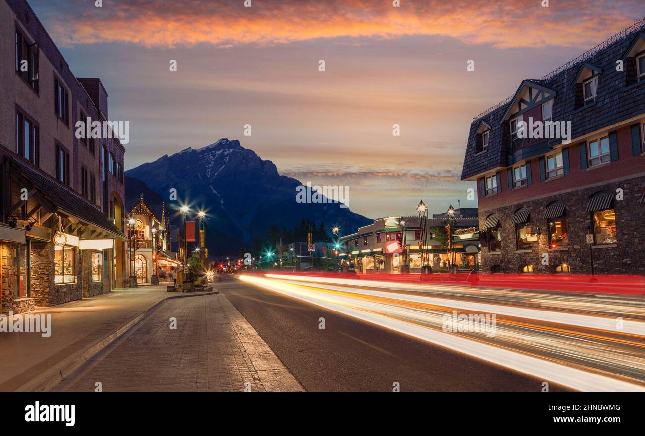 Sunset on Banff Avenue in Banff National Park with Cascade Mountain in ...