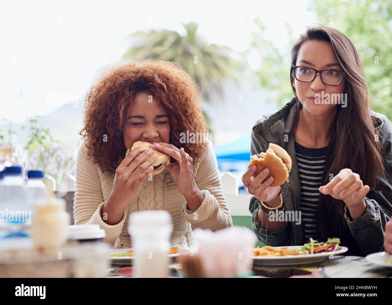 This is the best place in town. Cropped shot of a friends eating ...