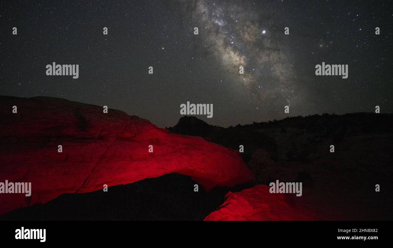 Landscape of a rock arch in the Canyonlands National Park under a ...