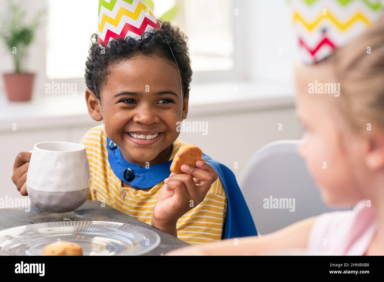 Child eating pastry hi-res stock photography and images - Alamy