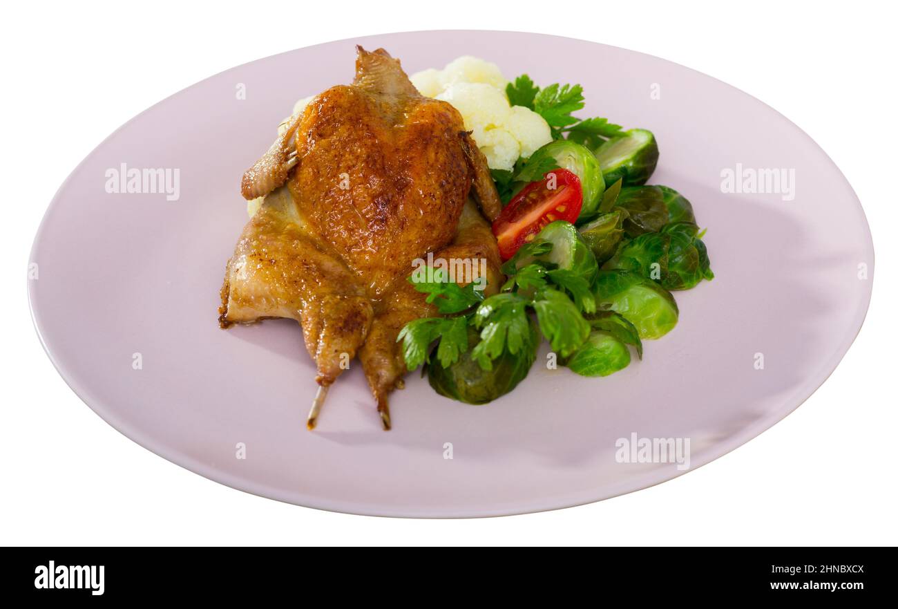 Grilled partridge with steamed vegetables Stock Photo - Alamy