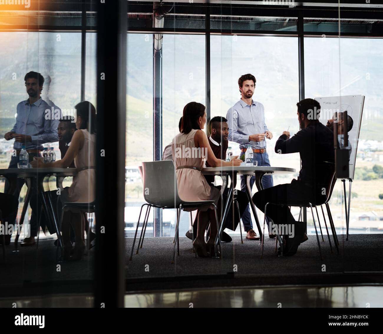 Hes always willing to answer any questions. Shot of a businessman ...