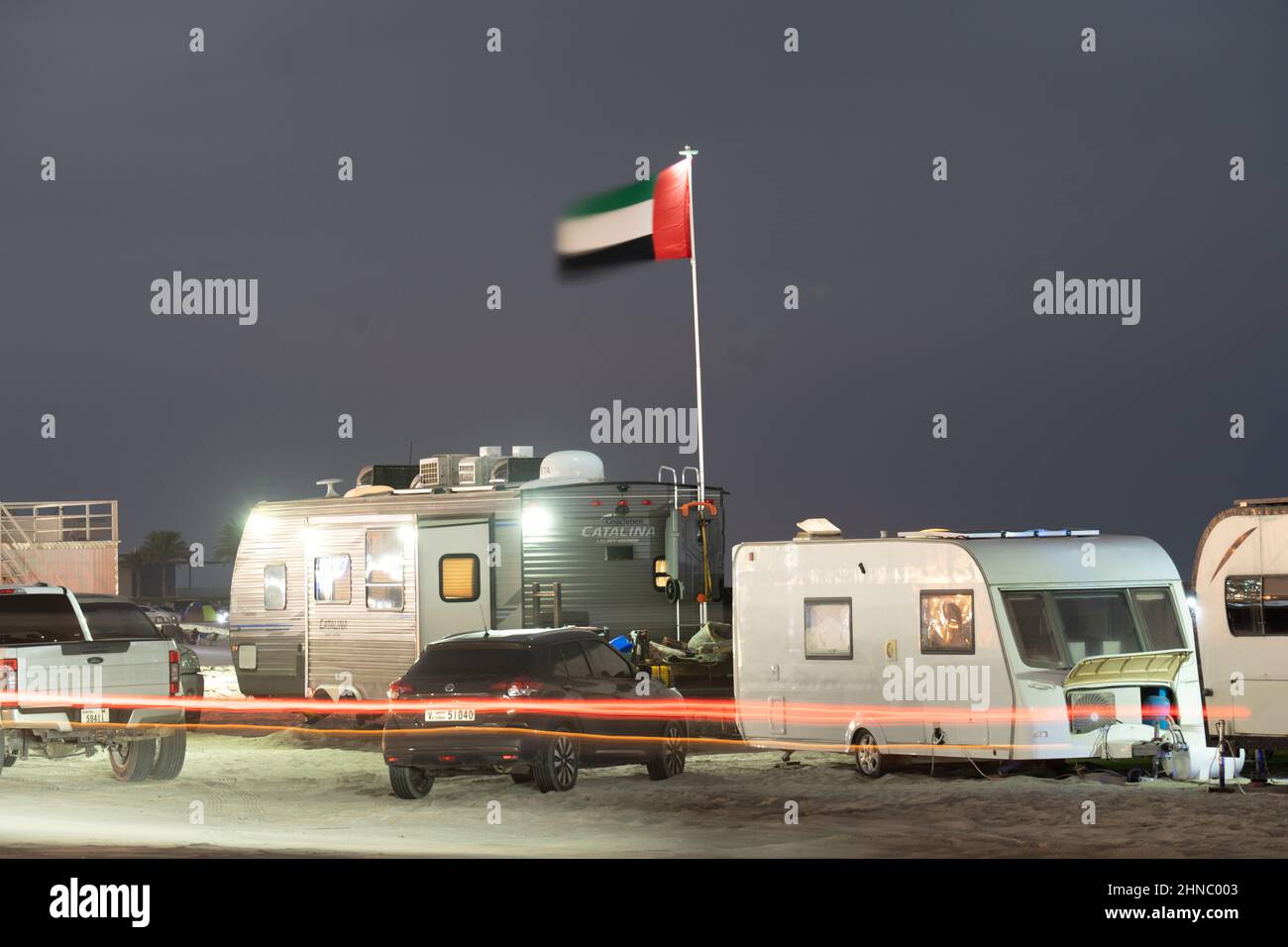 United Arab Emirates flag on the beach of Al-Zawra in the Emirate of ...