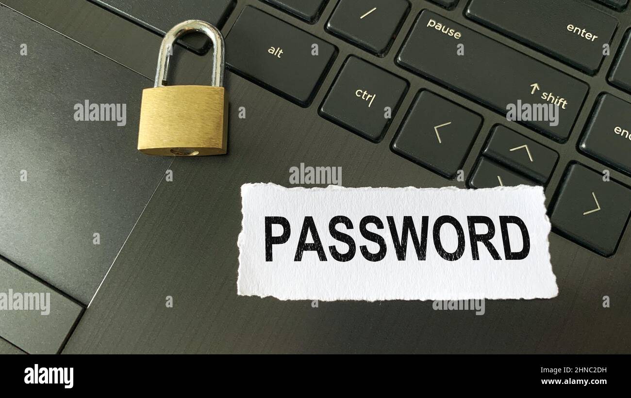Close up view of text on torn paper - Password. With blurred locker and ...