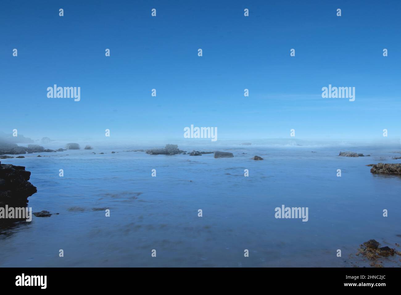 Sea view with blue sky background Stock Photo - Alamy
