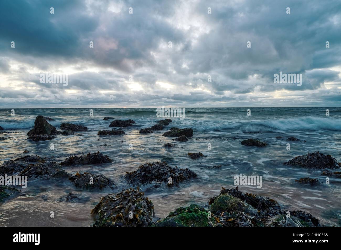 Landscape, seascape sunset on the coast of Huisduinen, the Netherlands ...