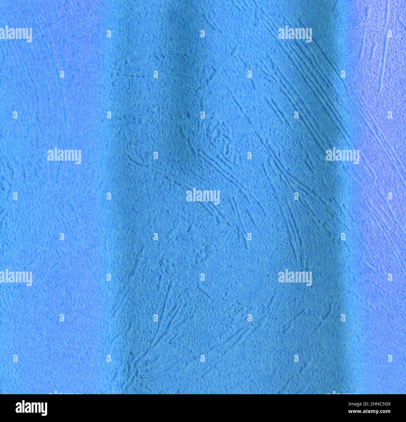 Blue light and shadows on a textured wall, natural window shadow ...