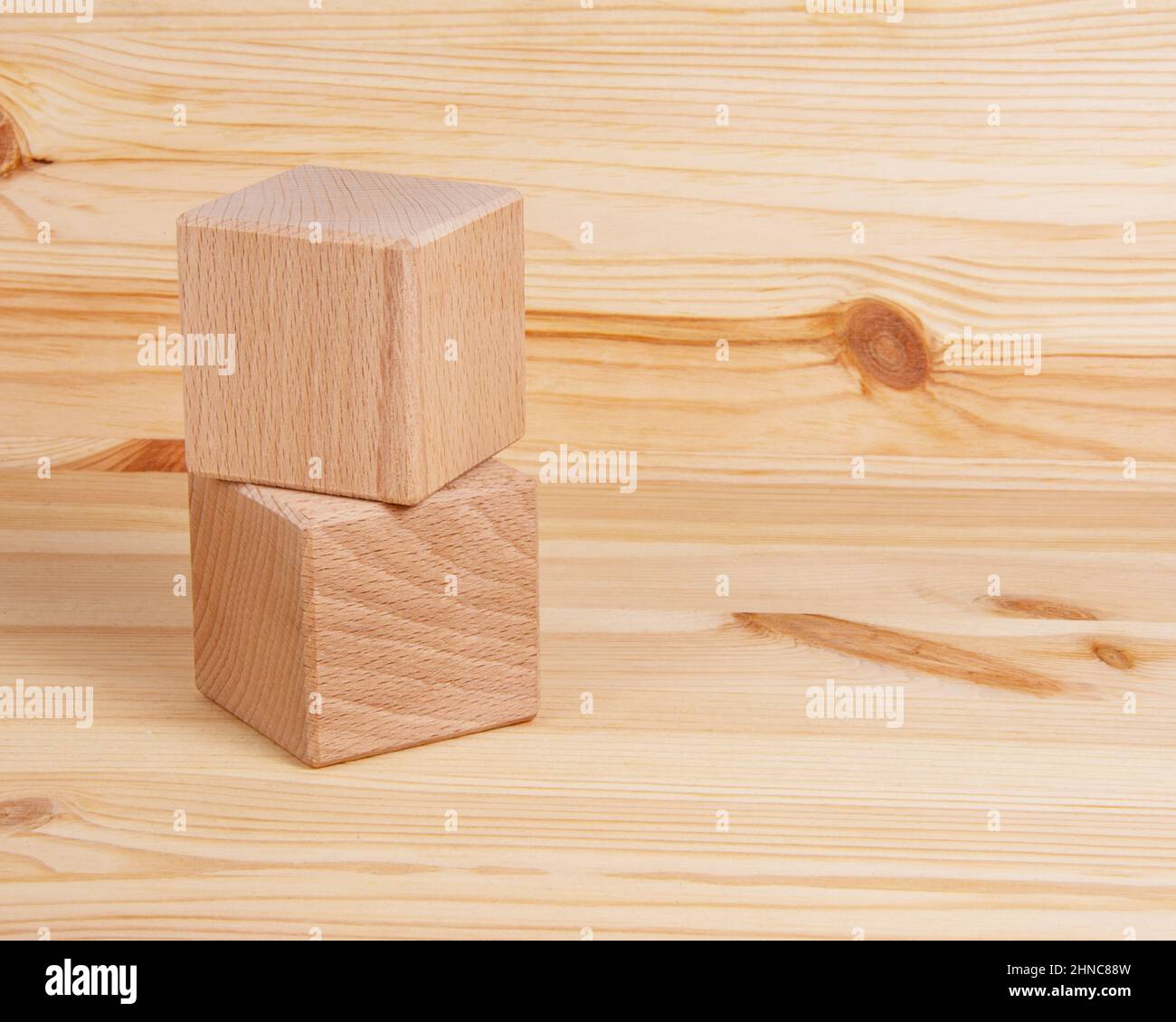 Bright wooden cube square on wood vintage background copyspace Stock ...