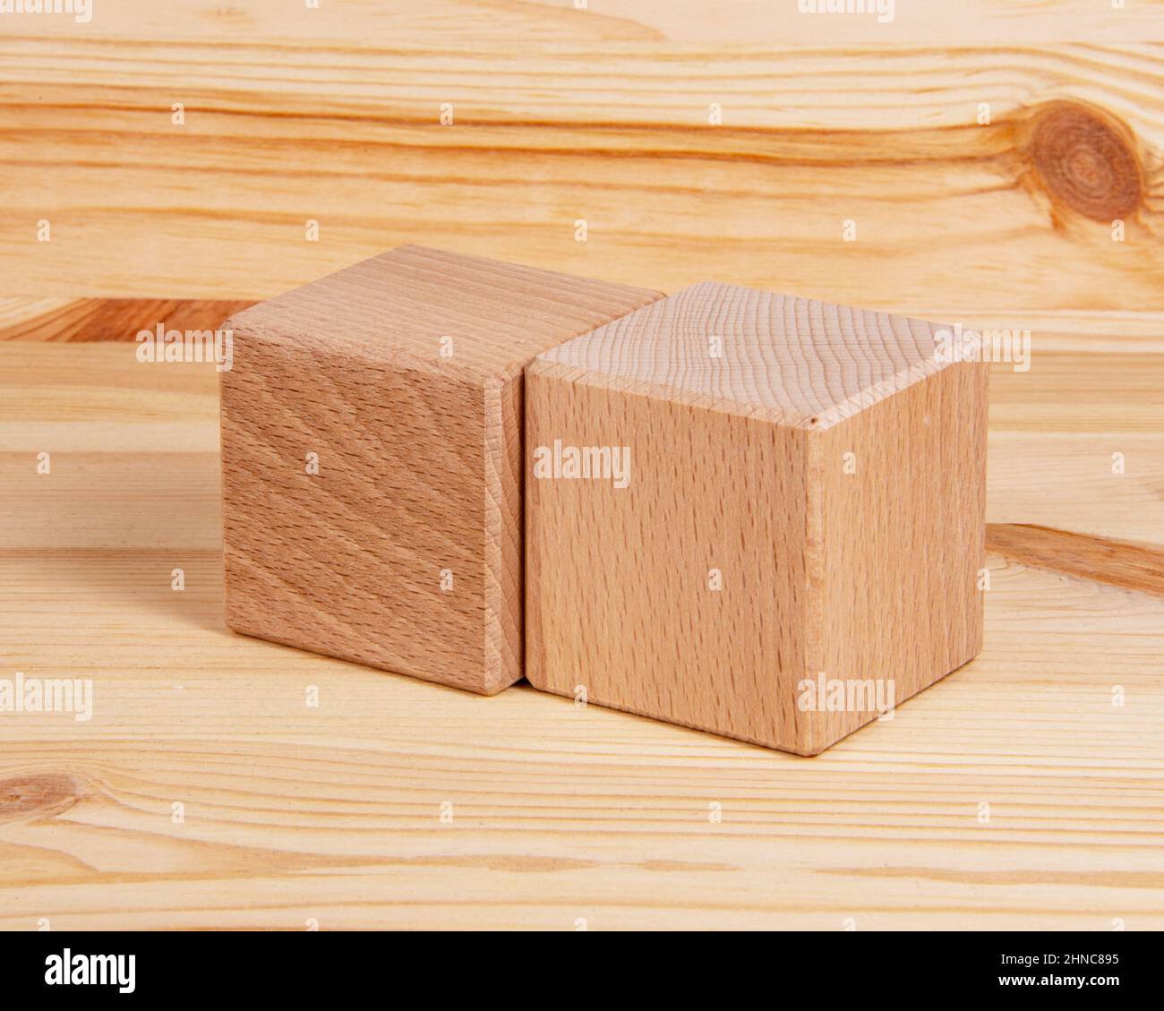 Bright wooden cube square on wood vintage background copyspace Stock ...
