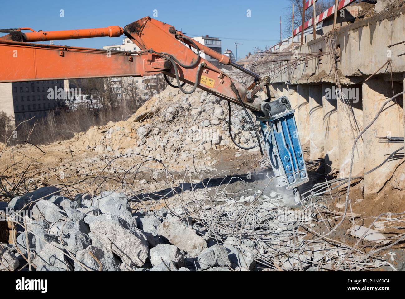 Professional demolition of reinforced concrete structures with an ...