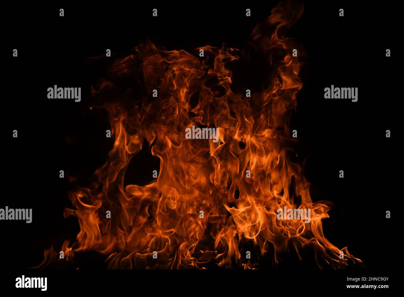 Fire flame burning and fire glowing on black background Stock Photo - Alamy