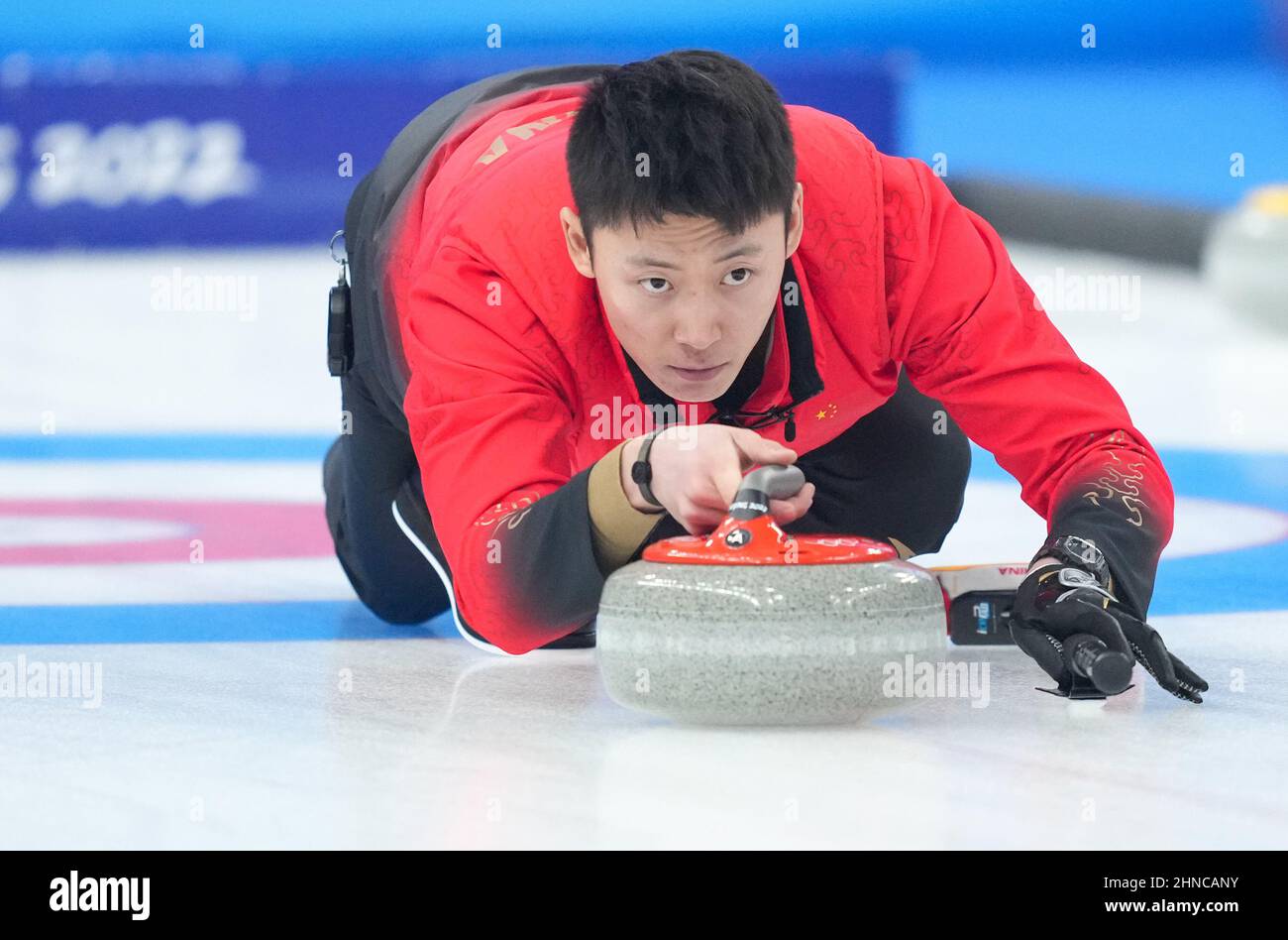 Beijing, China. 16th Feb, 2022. Ma Xiuyue of China curls the stone ...