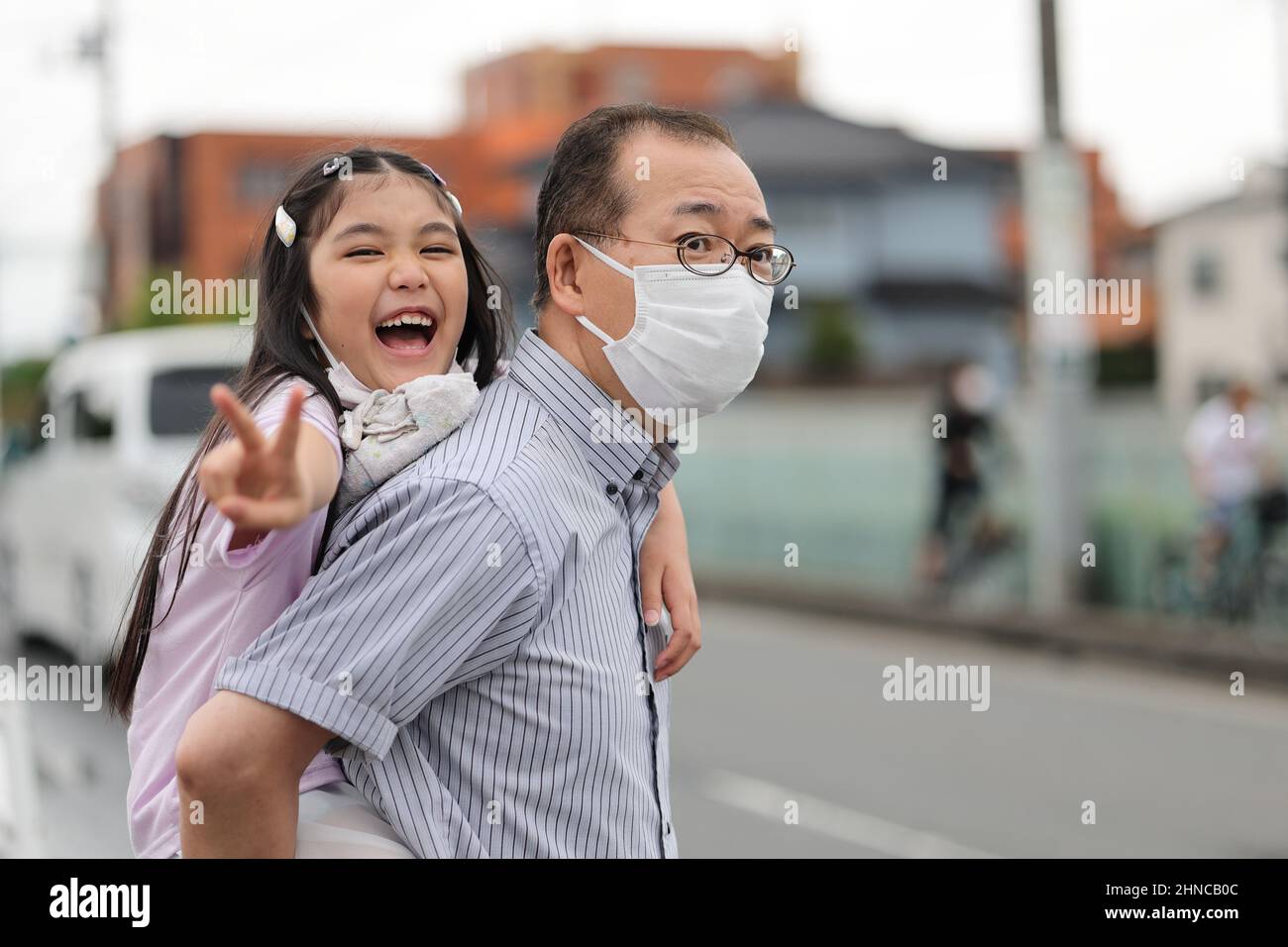 Riding piggy back piggyback hi-res stock photography and images - Alamy