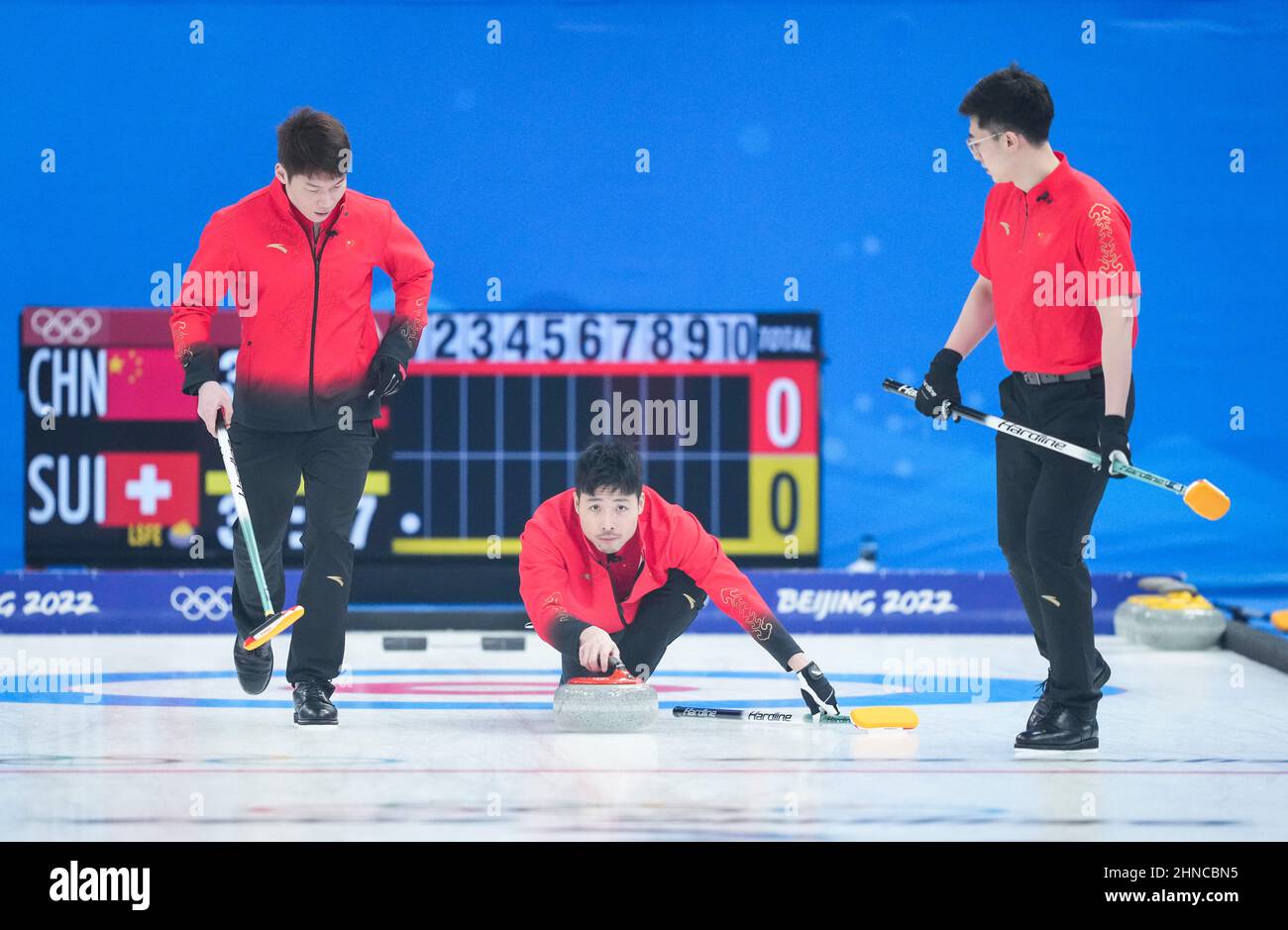 Beijing, China. 16th Feb, 2022. (L to R) Wang Zhiyu, Zou Qiang, Xu ...