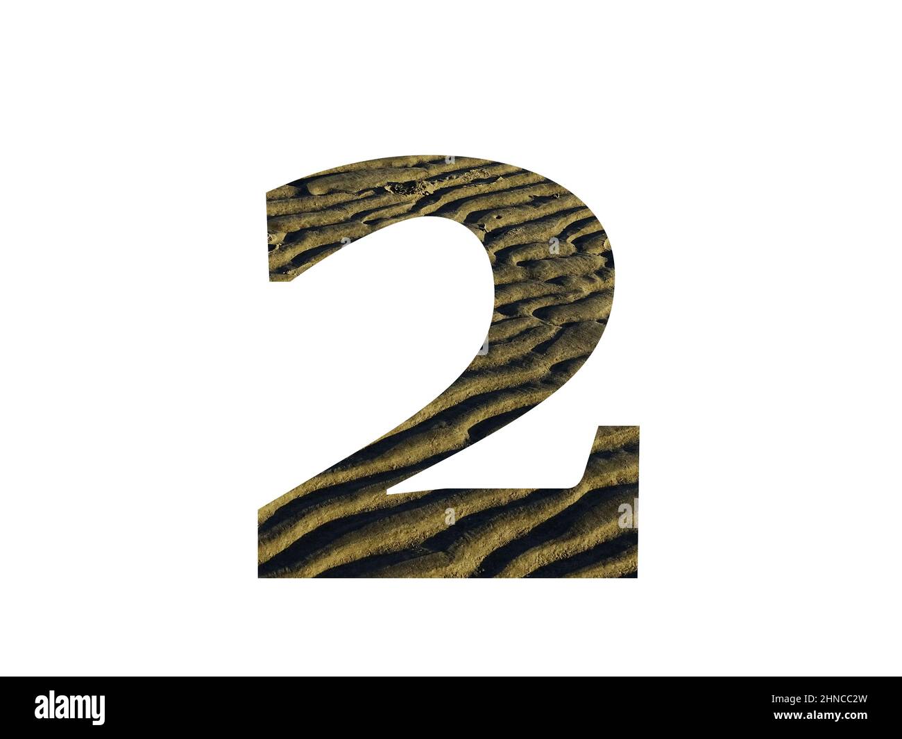 number 2 of the alphabet made with ridges from the beach, color yellow ...