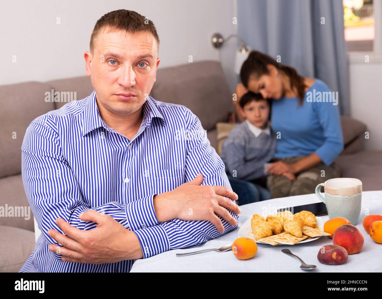 Sad man after disagreements with wife and son Stock Photo - Alamy