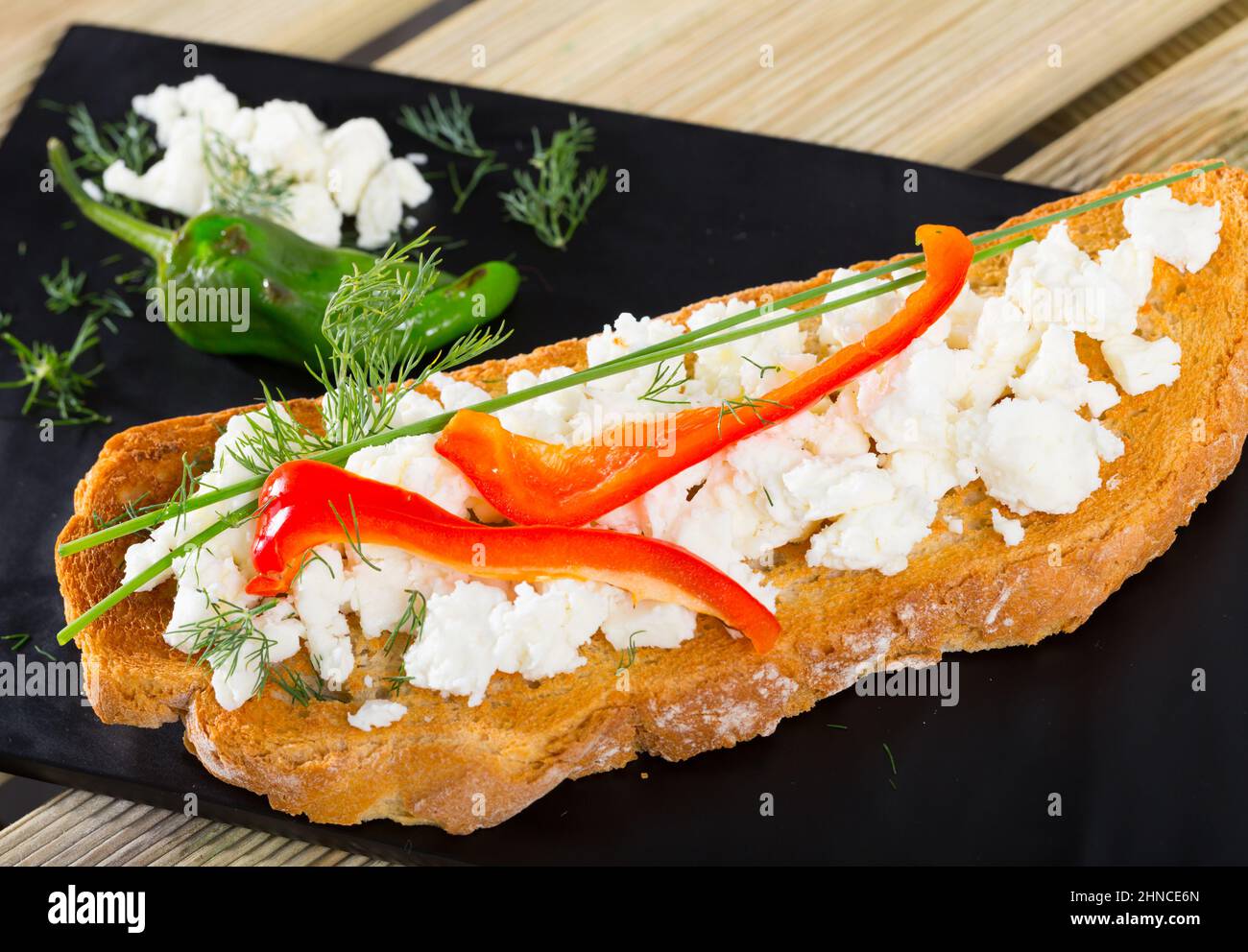 Sandwich with young cheese and pepper Stock Photo - Alamy