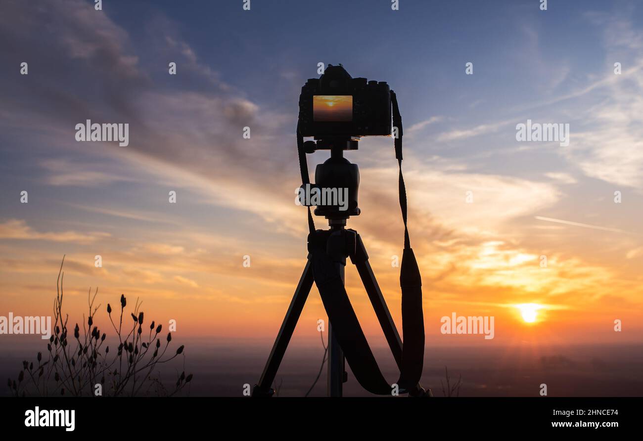 Tripod and sunset hi-res stock photography and images - Alamy