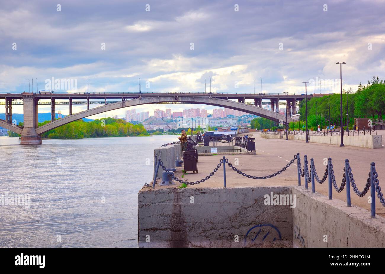 Krasnoyarsk, Siberia, Russia-09.01.2021: Communal arch bridge over the ...