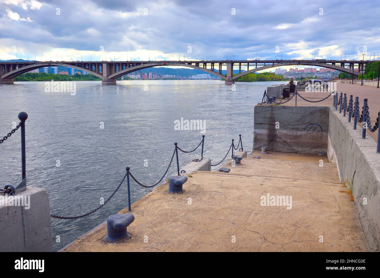 Krasnoyarsk, Siberia, Russia-09.01.2021: Communal arch bridge over the ...
