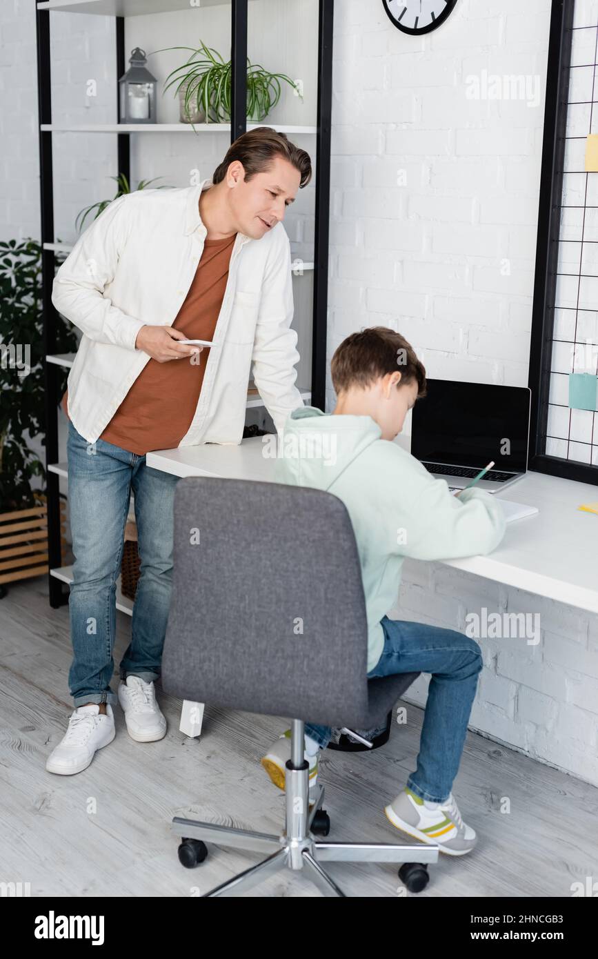 Stylish preteen boy holding hi-res stock photography and images - Alamy