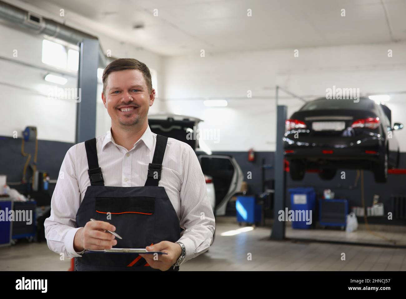 Man posing on car hi-res stock photography and images - Alamy