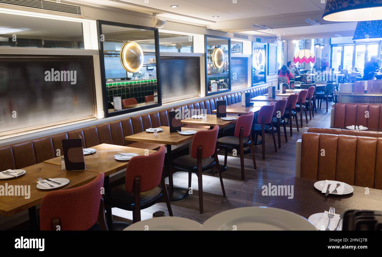 Interesting interior of cozy urban restaurant in style of bistro Stock ...