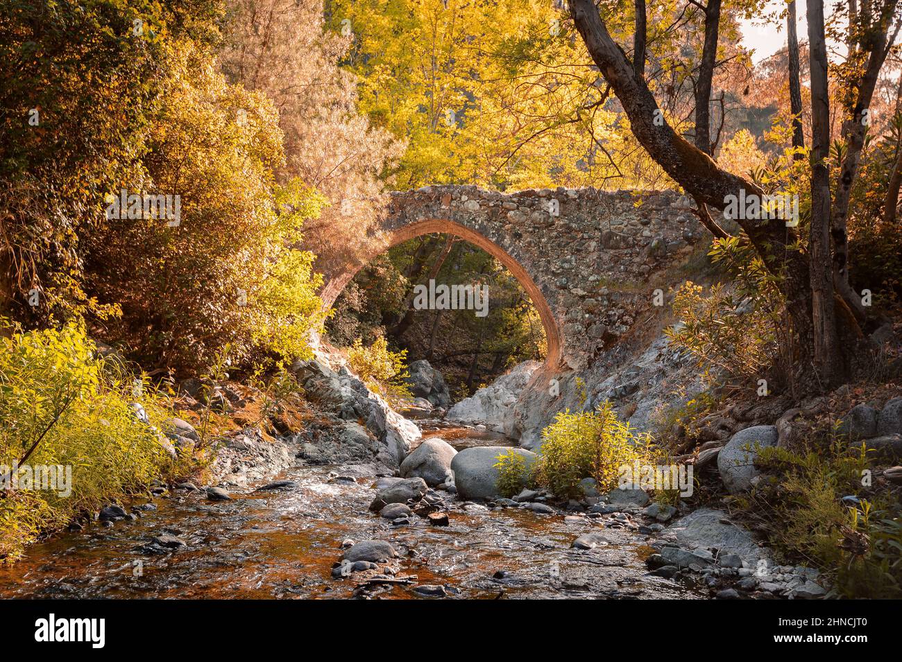 Elia Bridge - ancient stone bridge across a narrow mountain river on ...