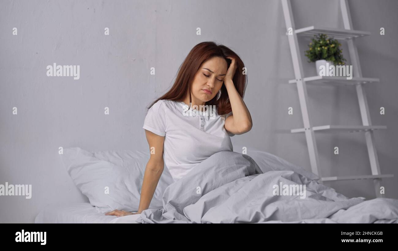 Unhappy adult woman sit hi-res stock photography and images - Alamy
