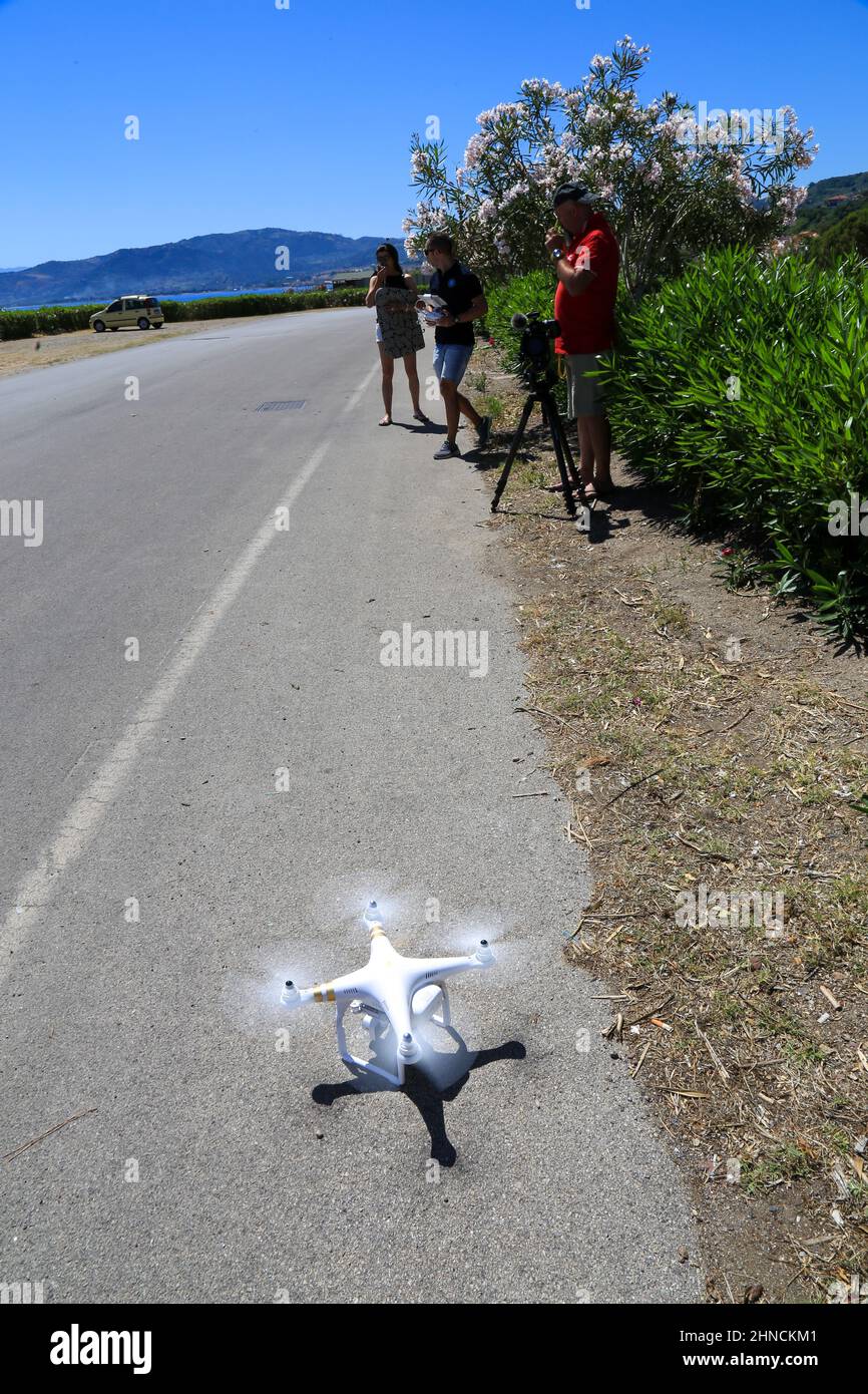 Using drone and video camera for shooting on the road Stock Photo - Alamy