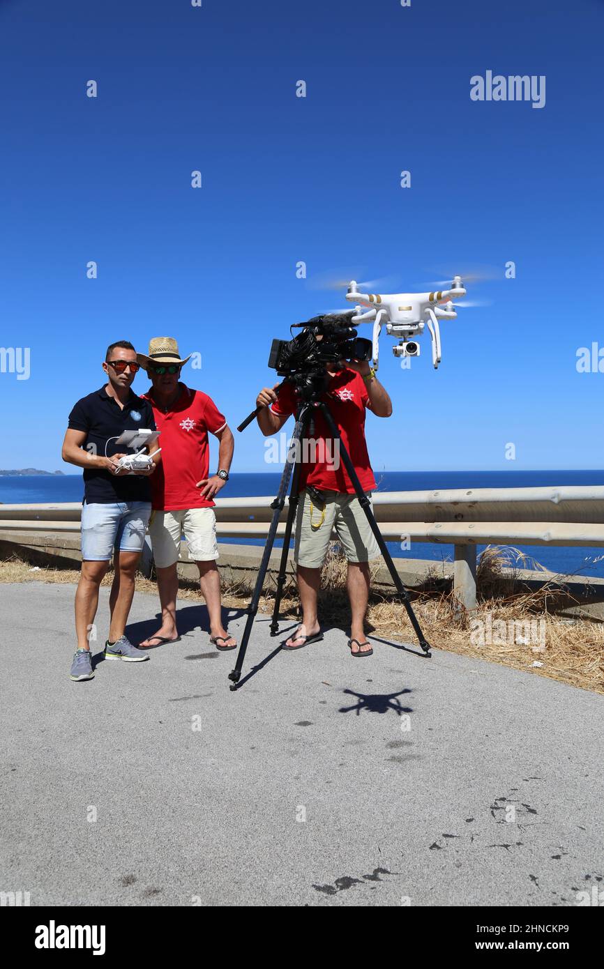 Using drone and video camera for shooting on the road Stock Photo - Alamy