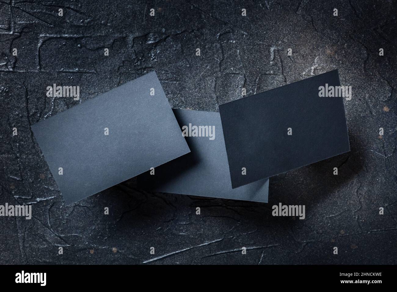 Black business card mock up on a dark background, a template for design ...