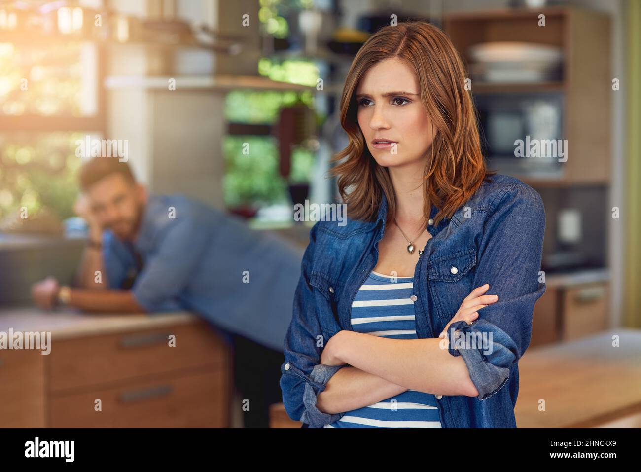 When poor communication causes conflict. Shot of a young woman looking ...