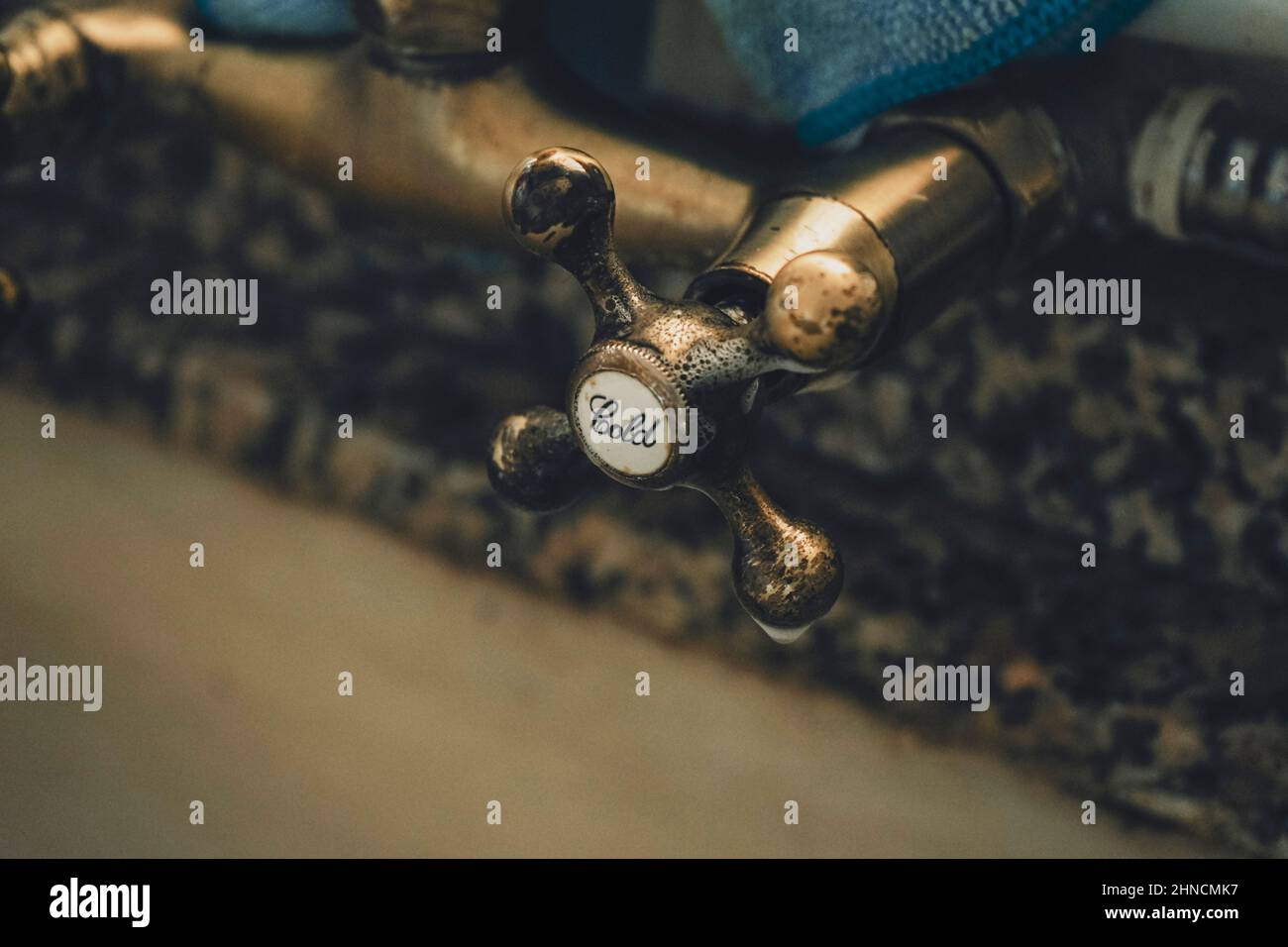 Retro water tap in an old sink Stock Photo - Alamy