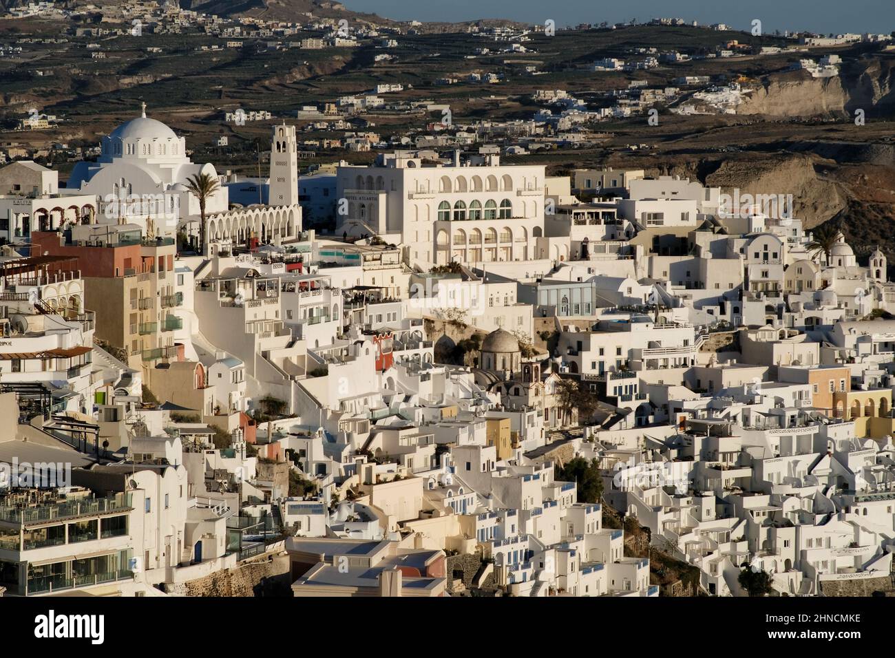 Amazing view of the famous village of Fira Santorini while the sun is ...