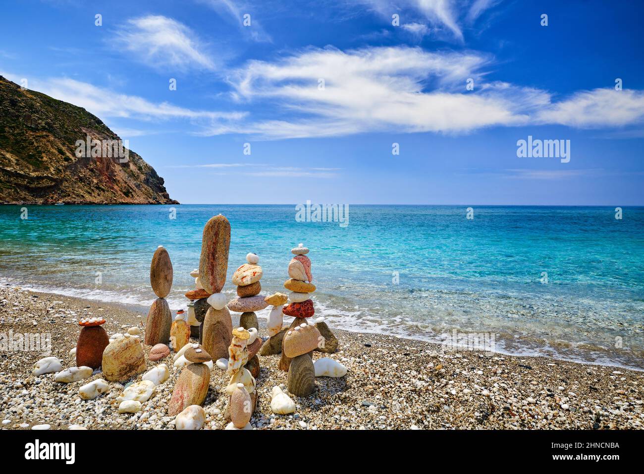 Group of balancing stones on beach. Bright sunny day, summer vibe ...
