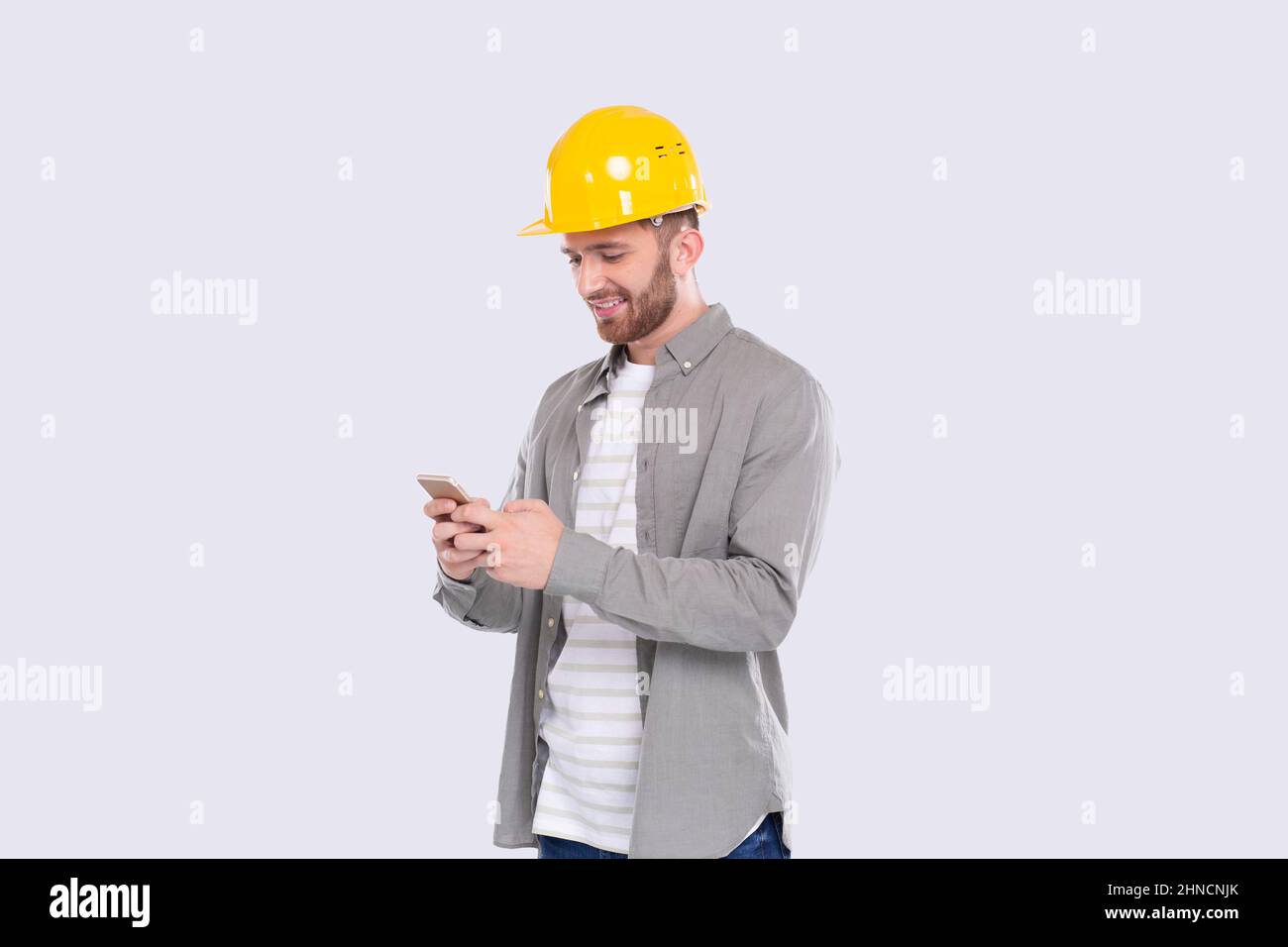 Construction Worker Standing Using Phone Isolated. Man Texting on Phone ...