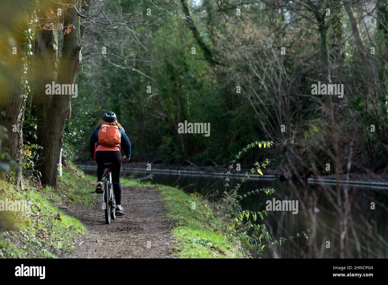 A cyclist by the Grand Union Canal near Lode Lane, Solihull, West ...