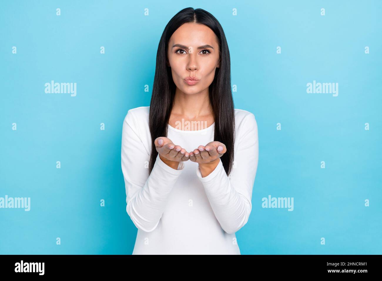 Photo of young lovely woman pouted lips send air kiss romantic feelings ...