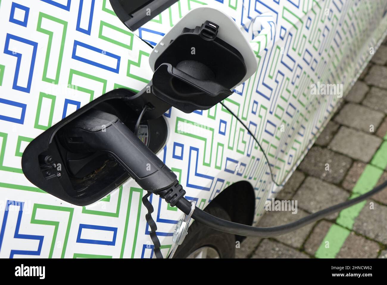 23 January 2022, Kaiserslautern, Germany, Close up of plugin recharging ...