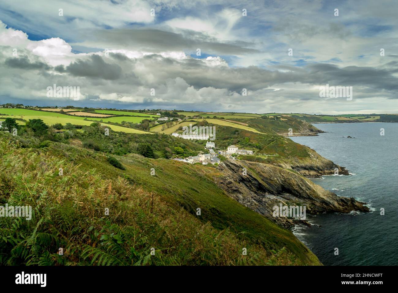 A view from the South West Coast Path from the cliffs above Portloe on ...