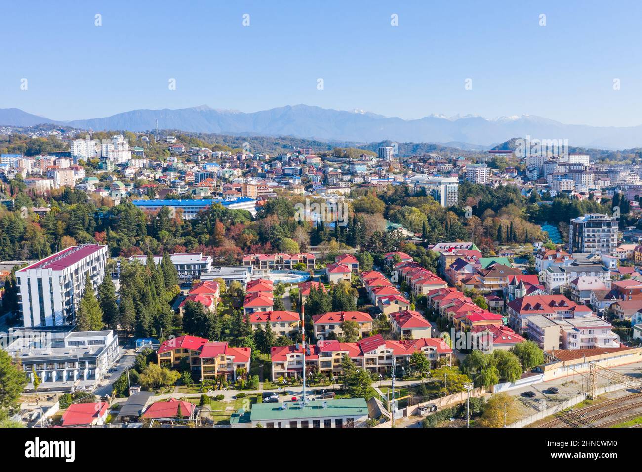 Coastal resort town by the sea and mountains in the distance Stock ...