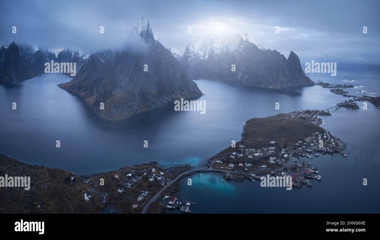 Aerial view of calm water of sea washing island with rocky formations ...