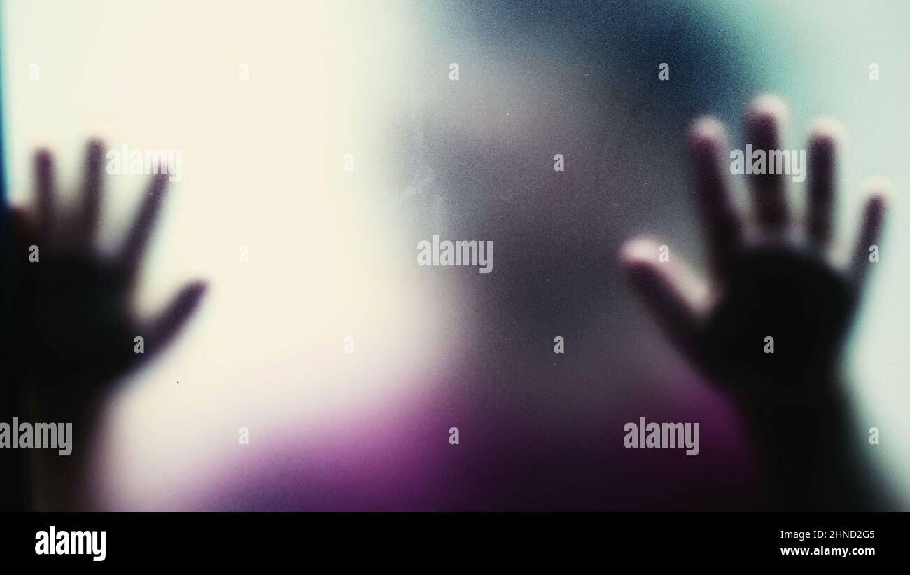 Child feeling trapped behind glass depression mental illness concept ...