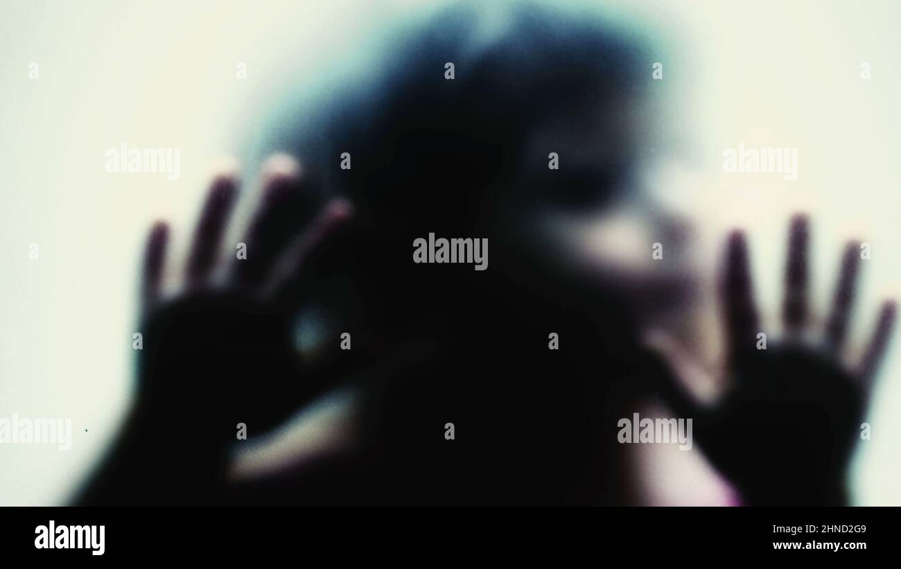 Child feeling trapped behind glass depression mental illness concept ...