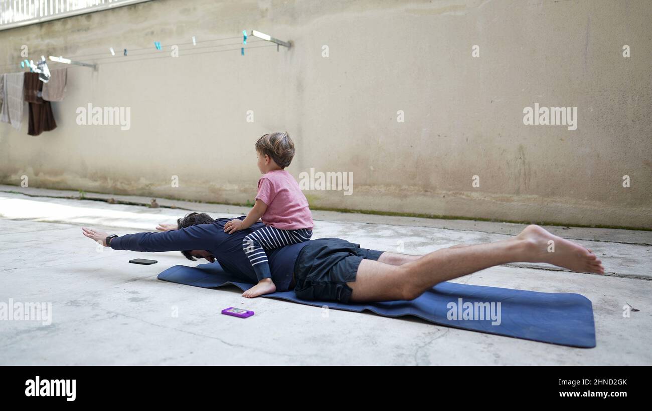 Child exercising with father real life dad and son relationship Stock ...