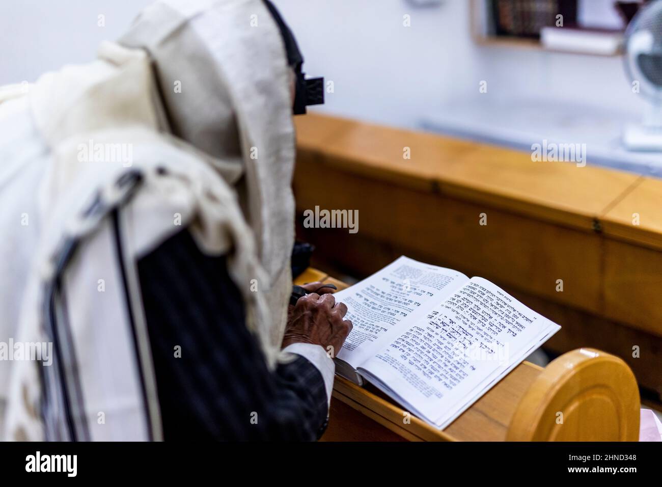 Aliyah to torah. Man in the temple celebration of bar mitzvah man is ...