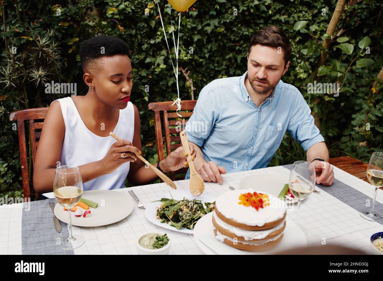 Enjoying a birthday lunch Stock Photo - Alamy